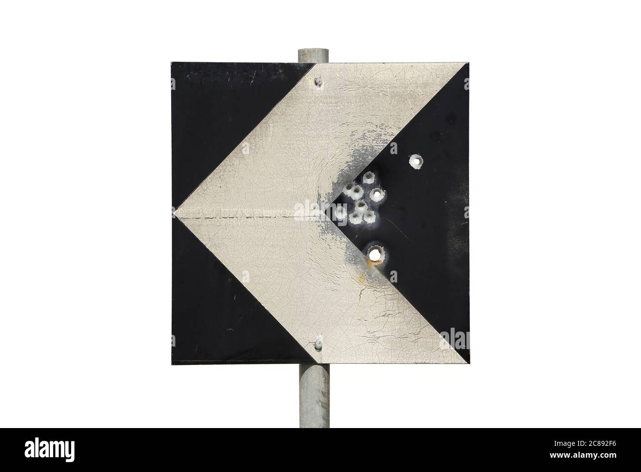 bullet holes on weathered road sign with arrow Stock Photo - Alamy