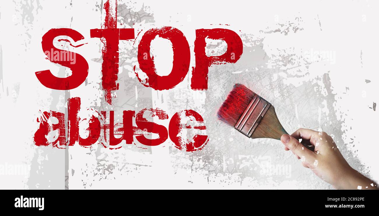 stop abuse hand with paintbrush on the grunge white wall Stock Photo ...