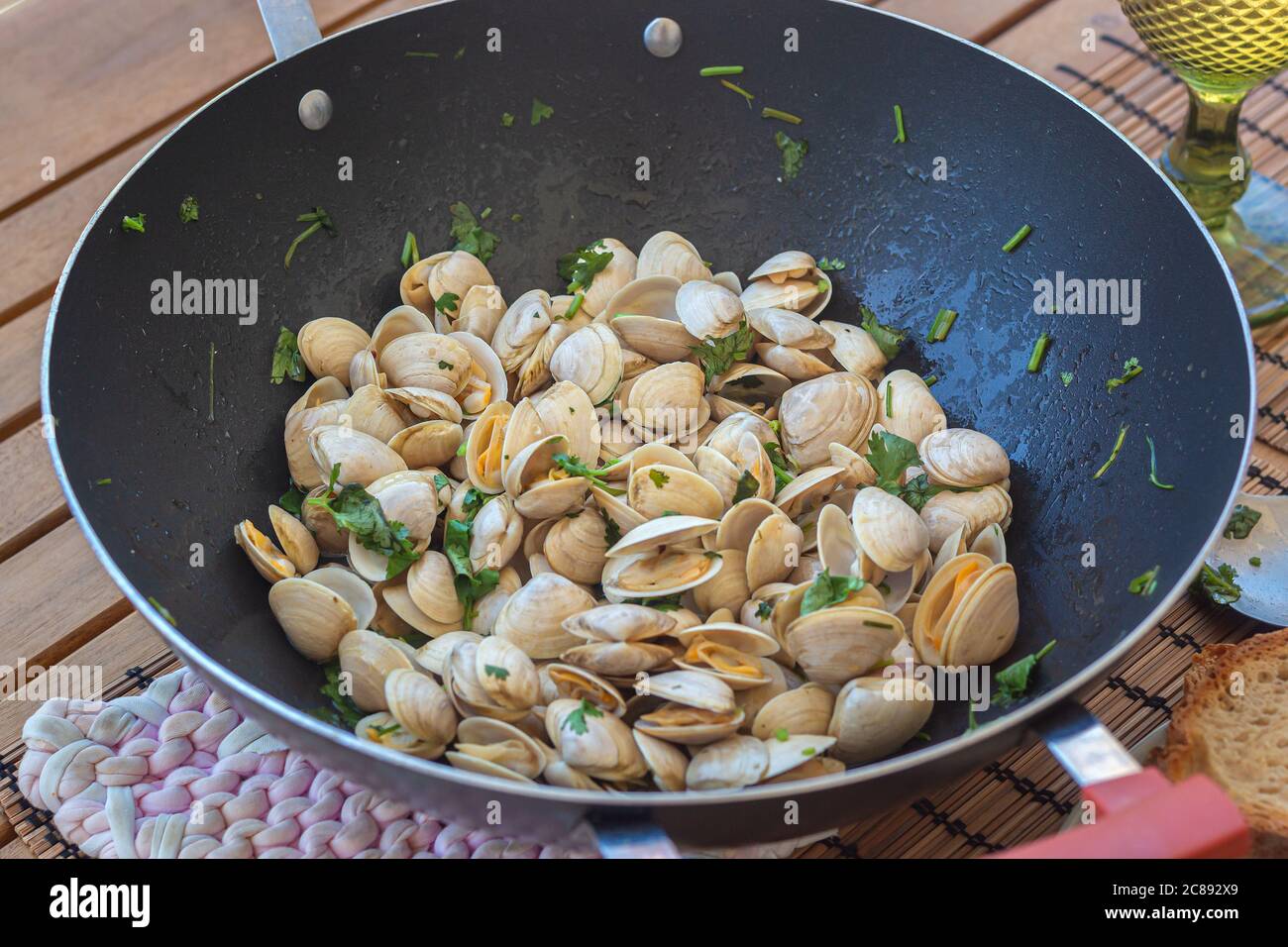 Clams cooked in a pan, healthy lunch Stock Photo - Alamy