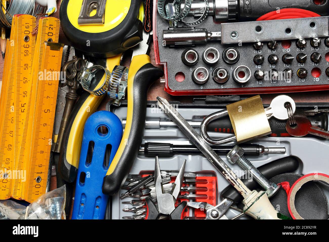 close up o random tools in drawer, top view Stock Photo - Alamy