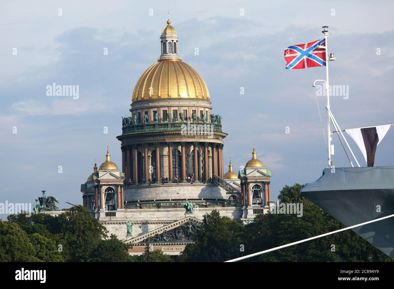 Russian Jack and fortress flag against St. Isaac Cathedral in St ...