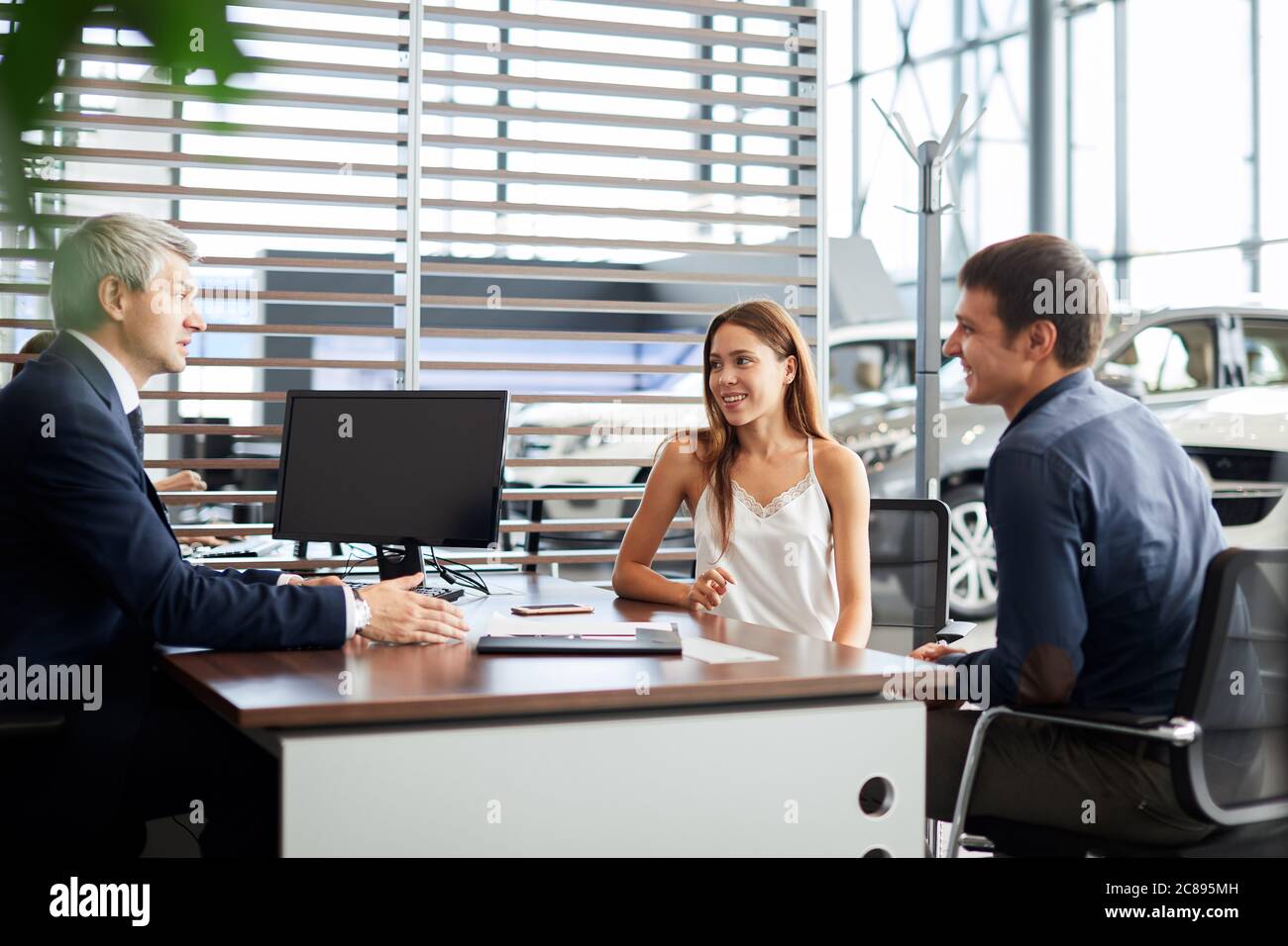 Car salesperson talking customer hi-res stock photography and images ...