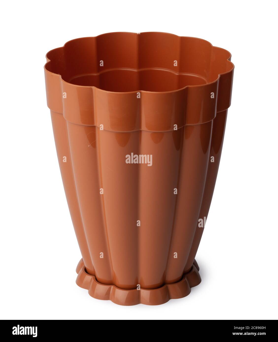 Brown plastic flower pot isolated on white Stock Photo - Alamy