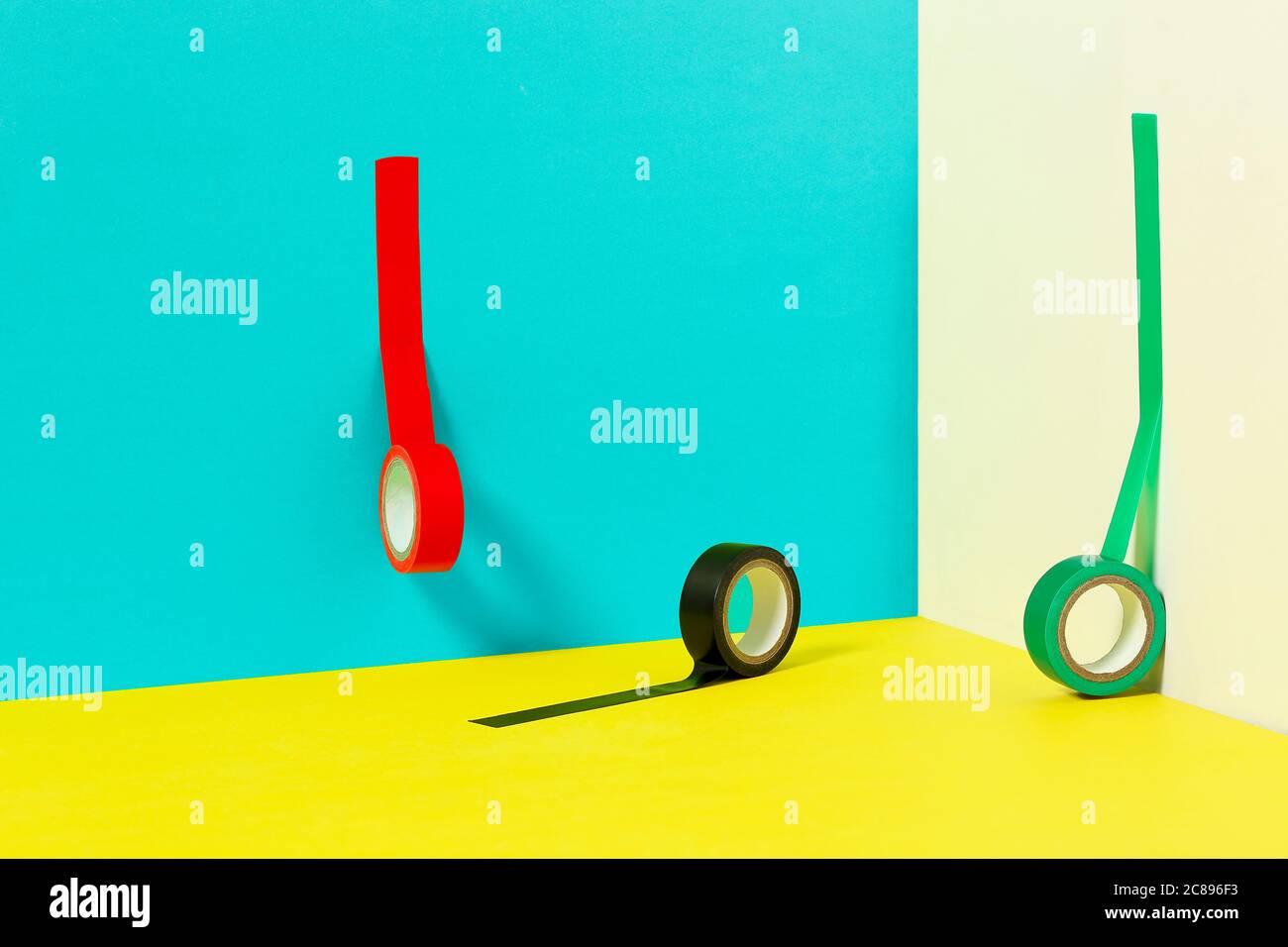 three colorful insulating tapes on walls and floor of different color ...