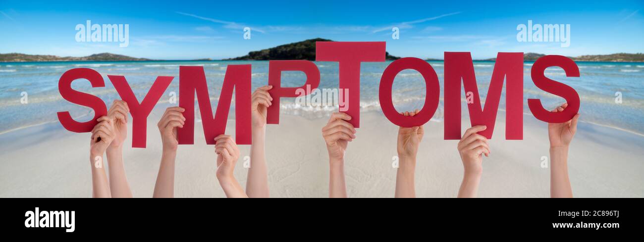 People Hands Holding Word Symptoms, Ocean Background Stock Photo - Alamy