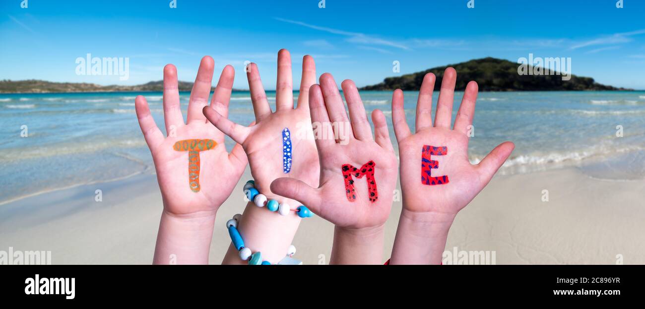Children Hands Building Word Time, Ocean Background Stock Photo - Alamy