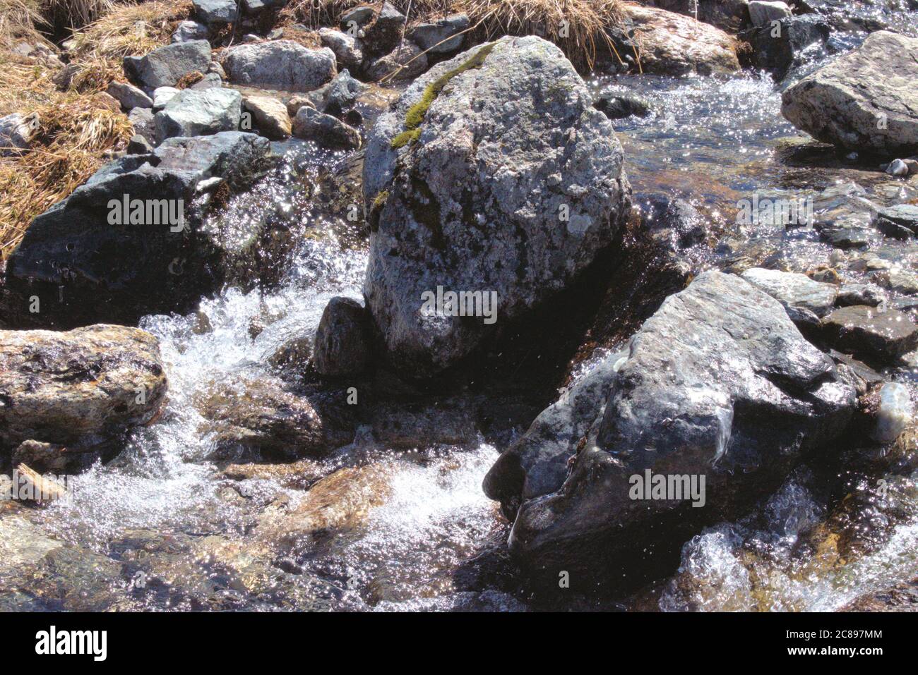 Little alpine waterfall at the Flüelapass in Switzerland Stock Photo ...