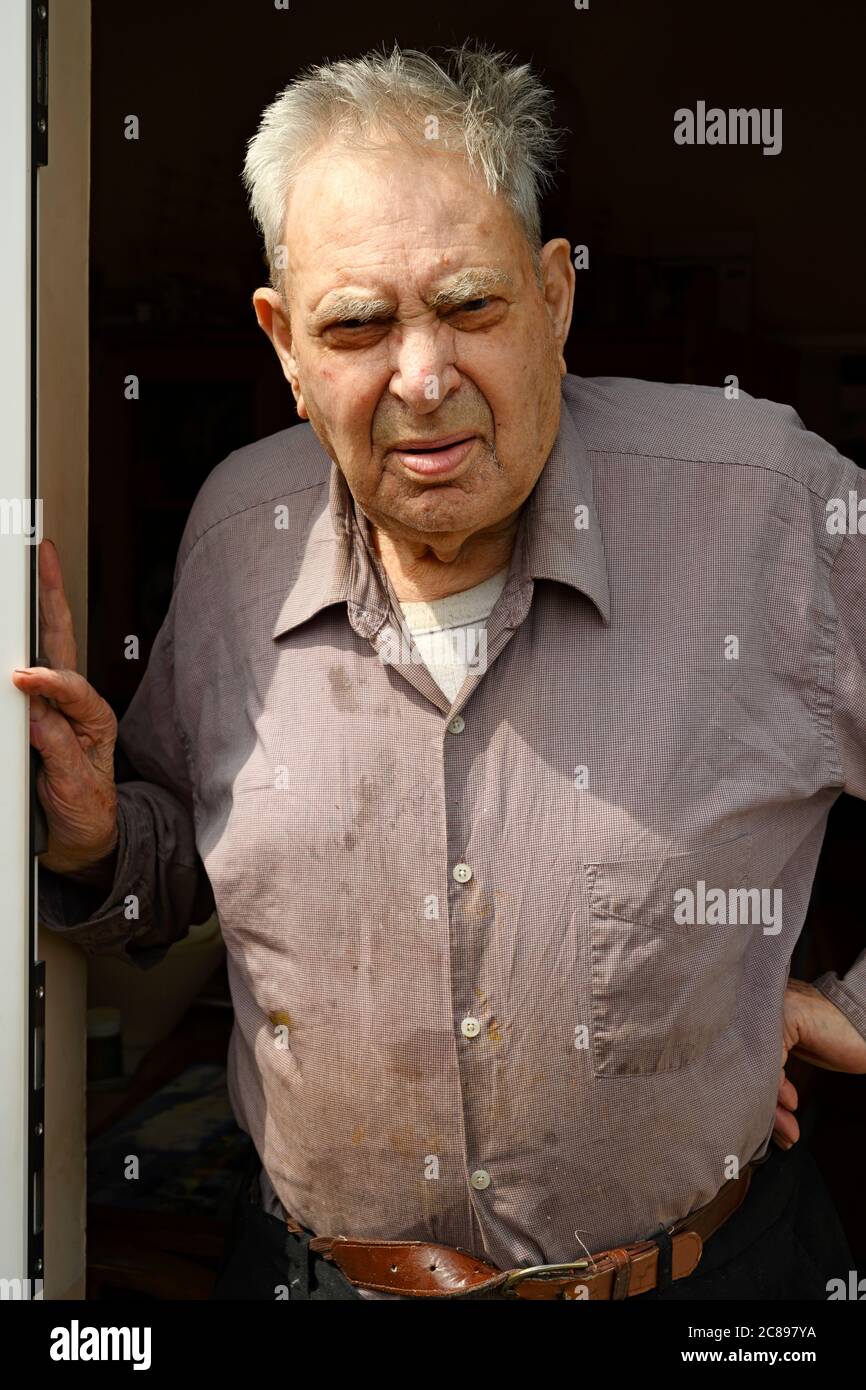 Elderly man on doorstep Stock Photo - Alamy