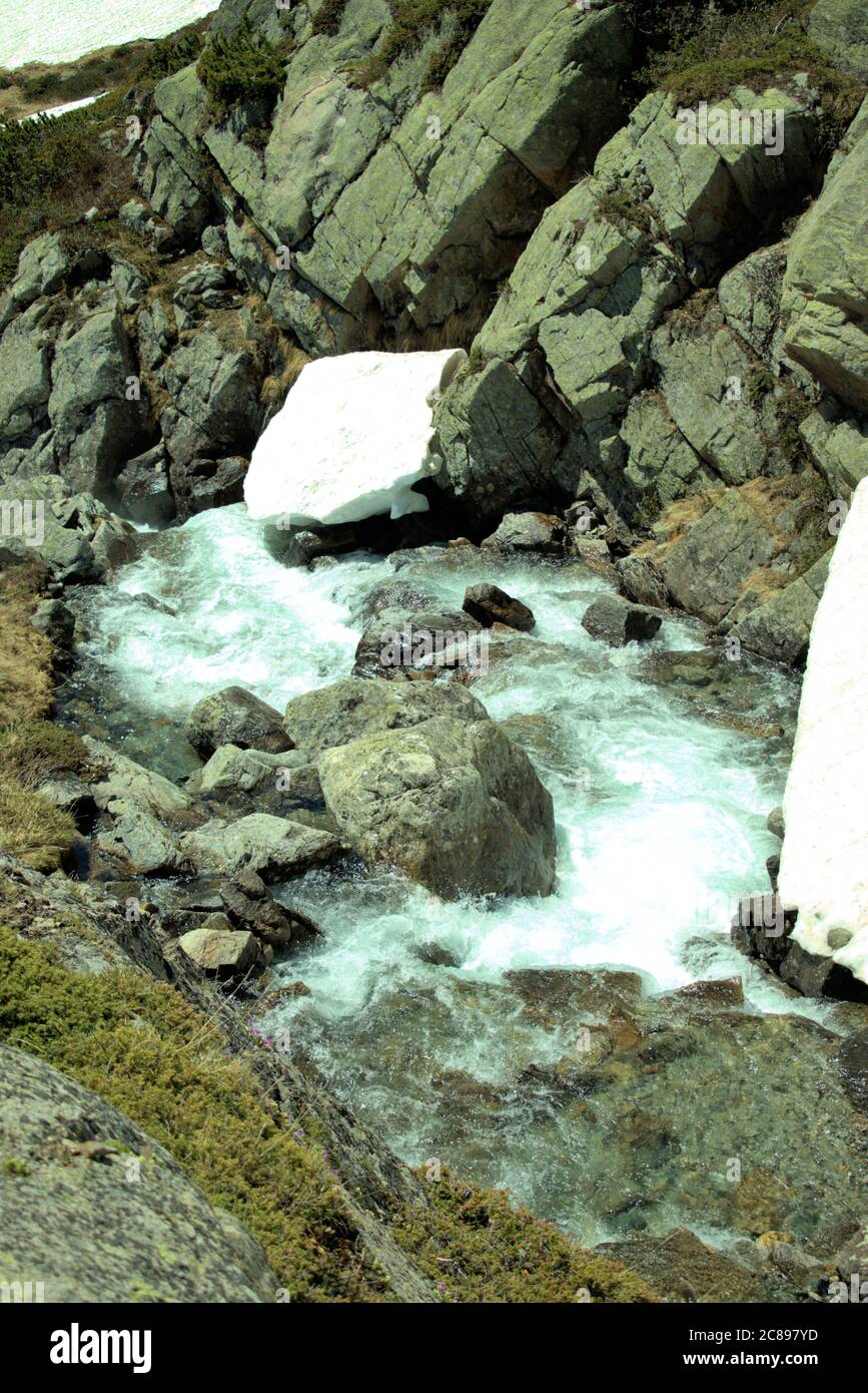 Little alpine waterfall at the Flüelapass in Switzerland Stock Photo ...