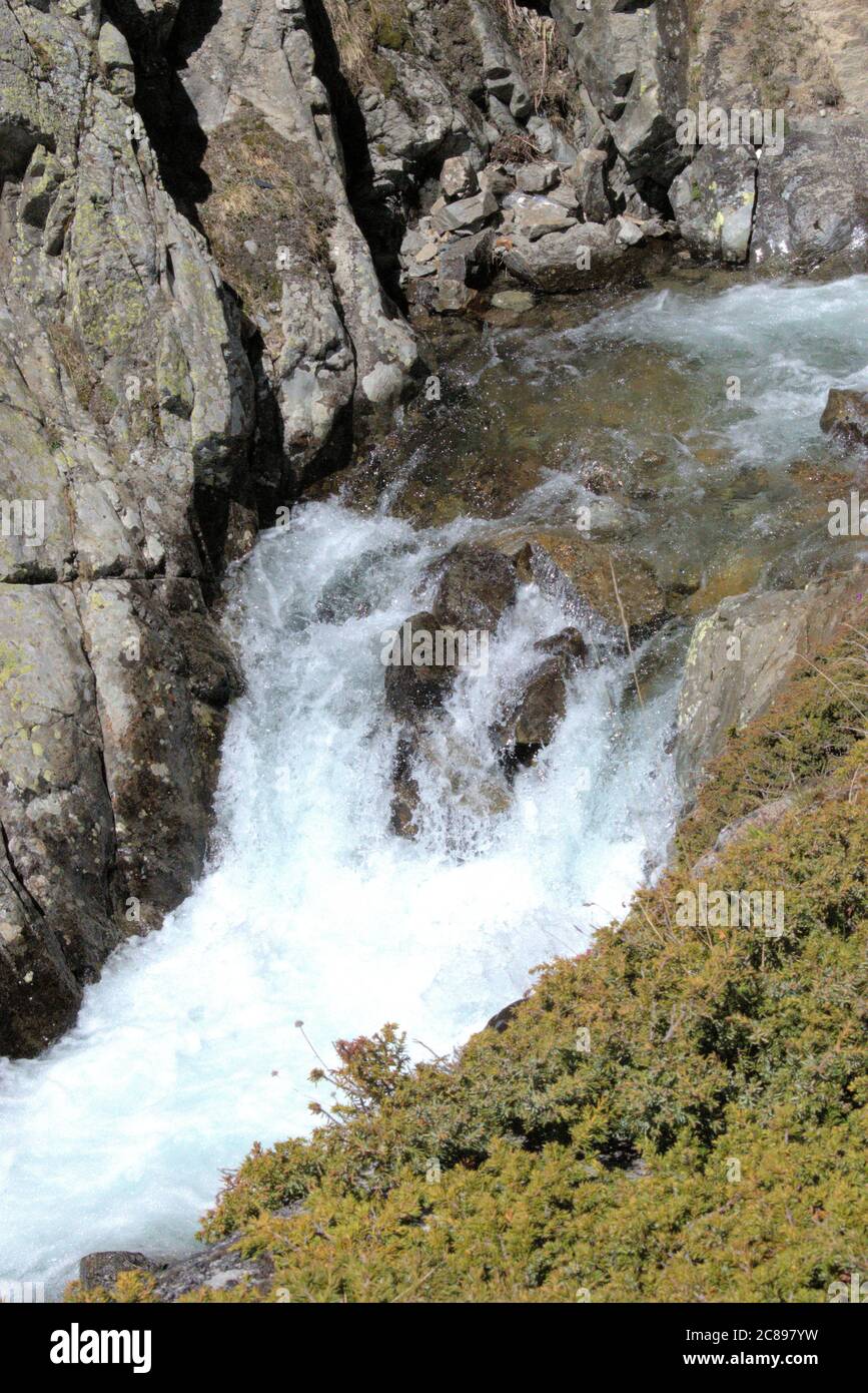 Little alpine waterfall at the Flüelapass in Switzerland Stock Photo ...