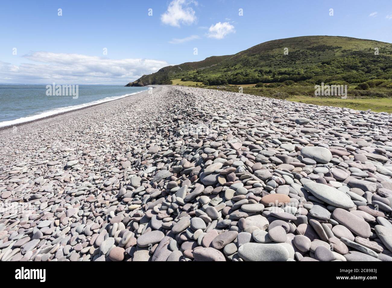 The shingle and pebble barrier ridge of Bossington Beach looking ...