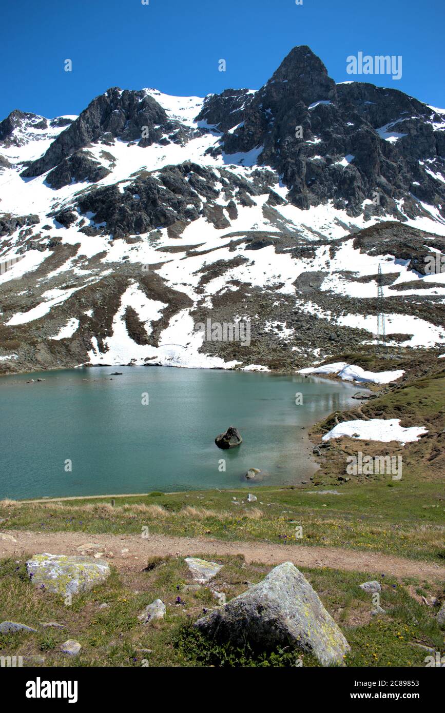 Small lake on top of the Julierpass in Switzerland Stock Photo - Alamy