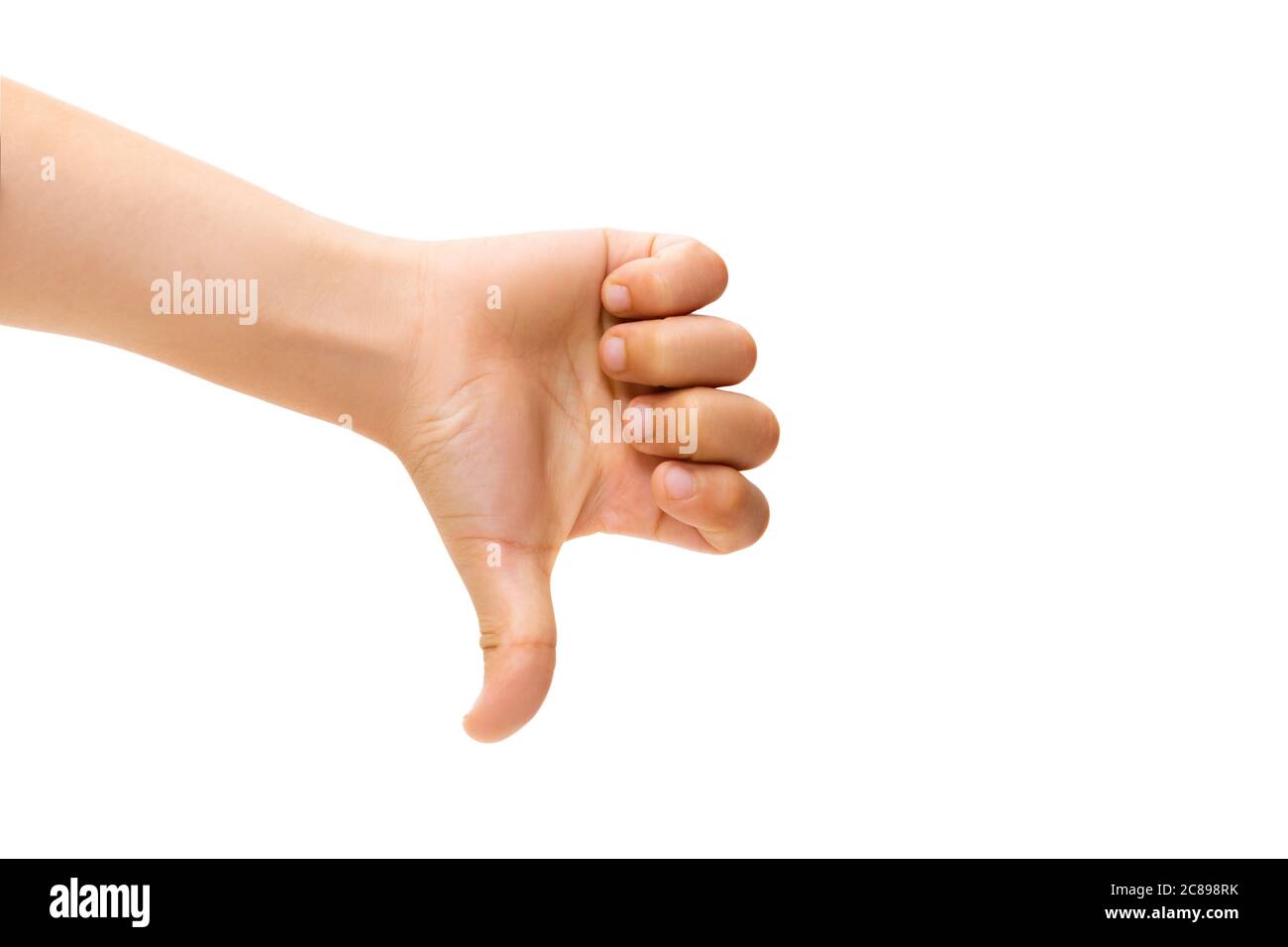 Thumb down. Children's hand, palm gesturing isolated on white studio ...
