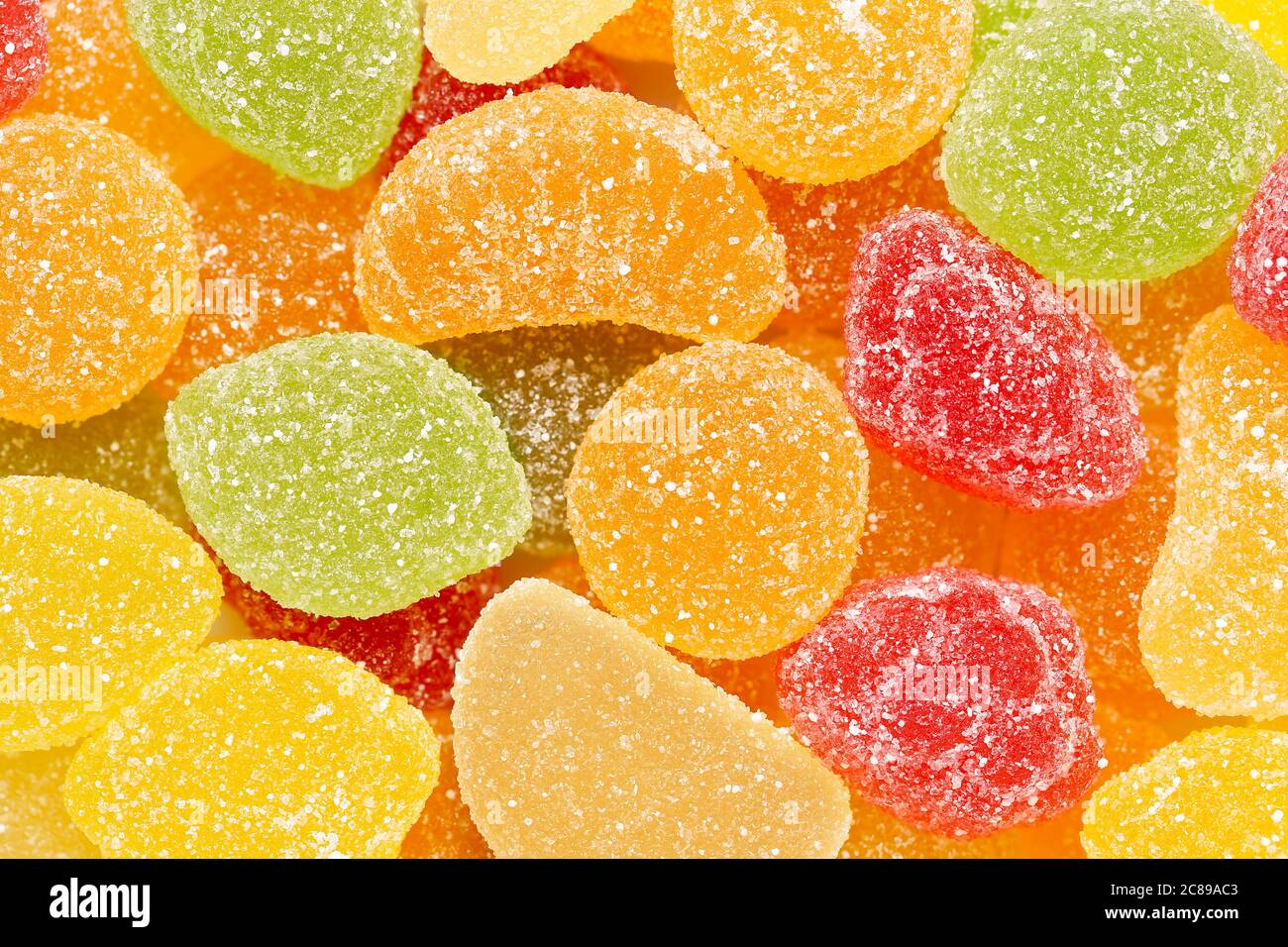 sugar coated jelly candy in the shape of fruit Stock Photo - Alamy