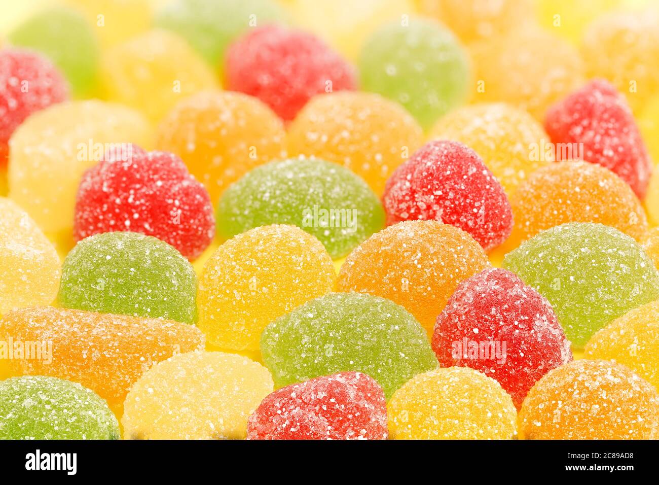 sugar coated jelly candy in the shape of fruit Stock Photo - Alamy
