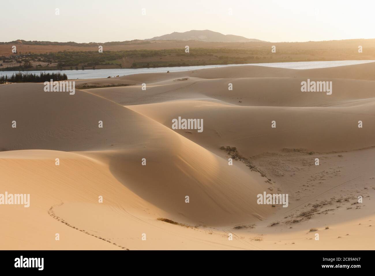 Sunset at sand dunes in Vietnam, Mui Ne Stock Photo - Alamy