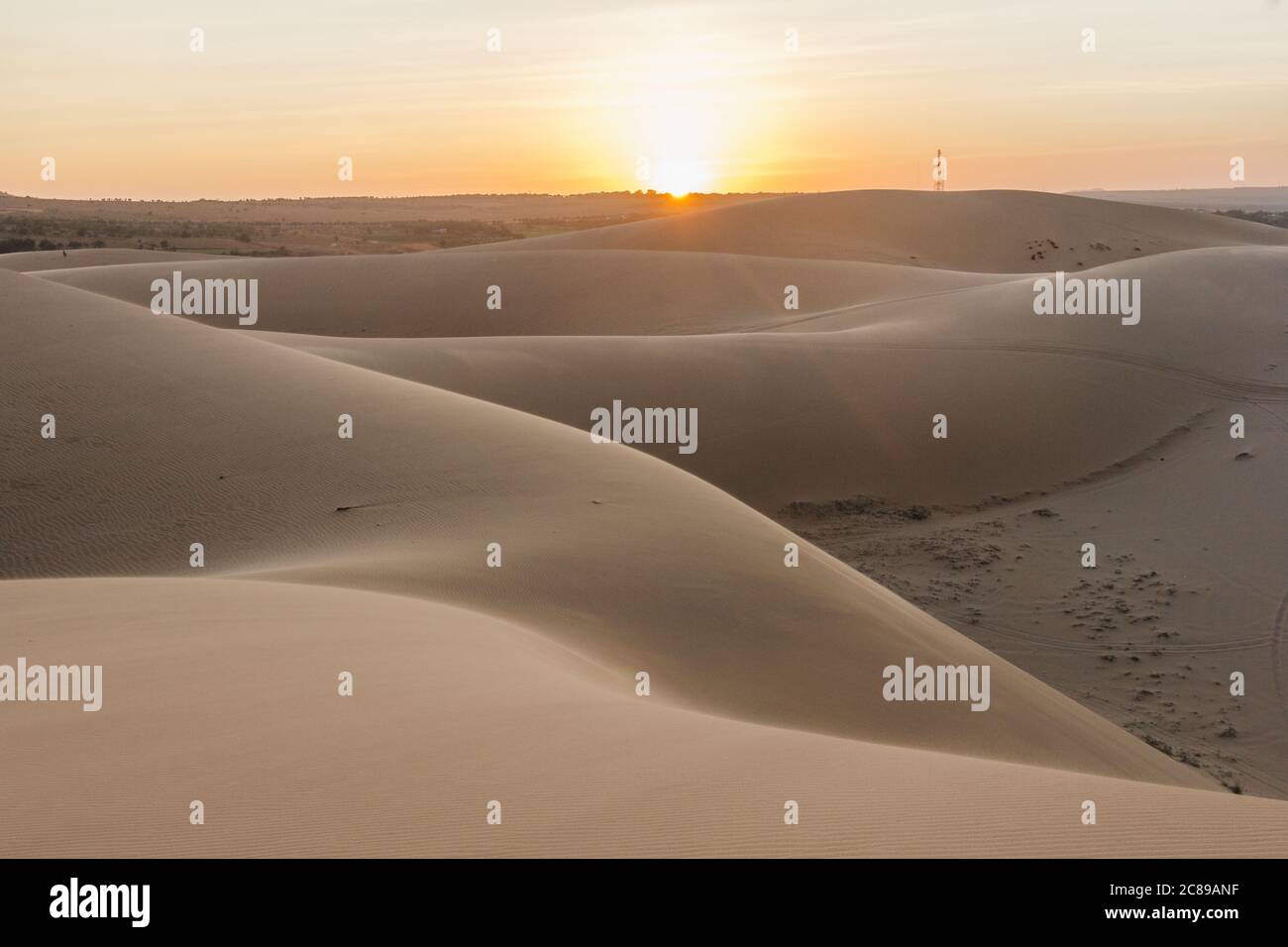 Sunset at sand dunes in Vietnam, Mui Ne Stock Photo - Alamy