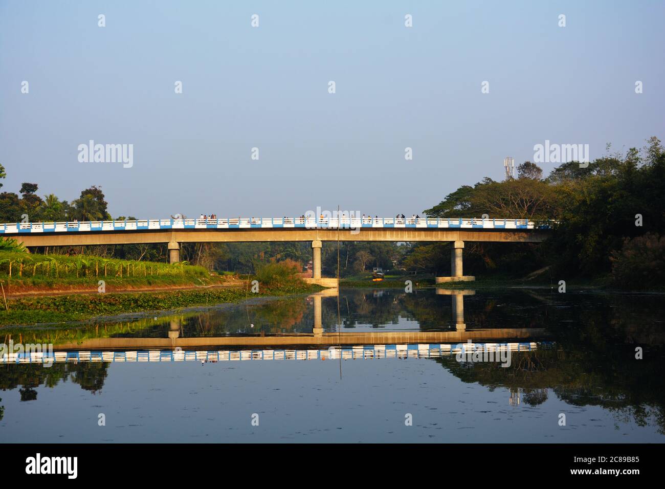 Concrete road bridge on pillars in an Indian village, selective ...