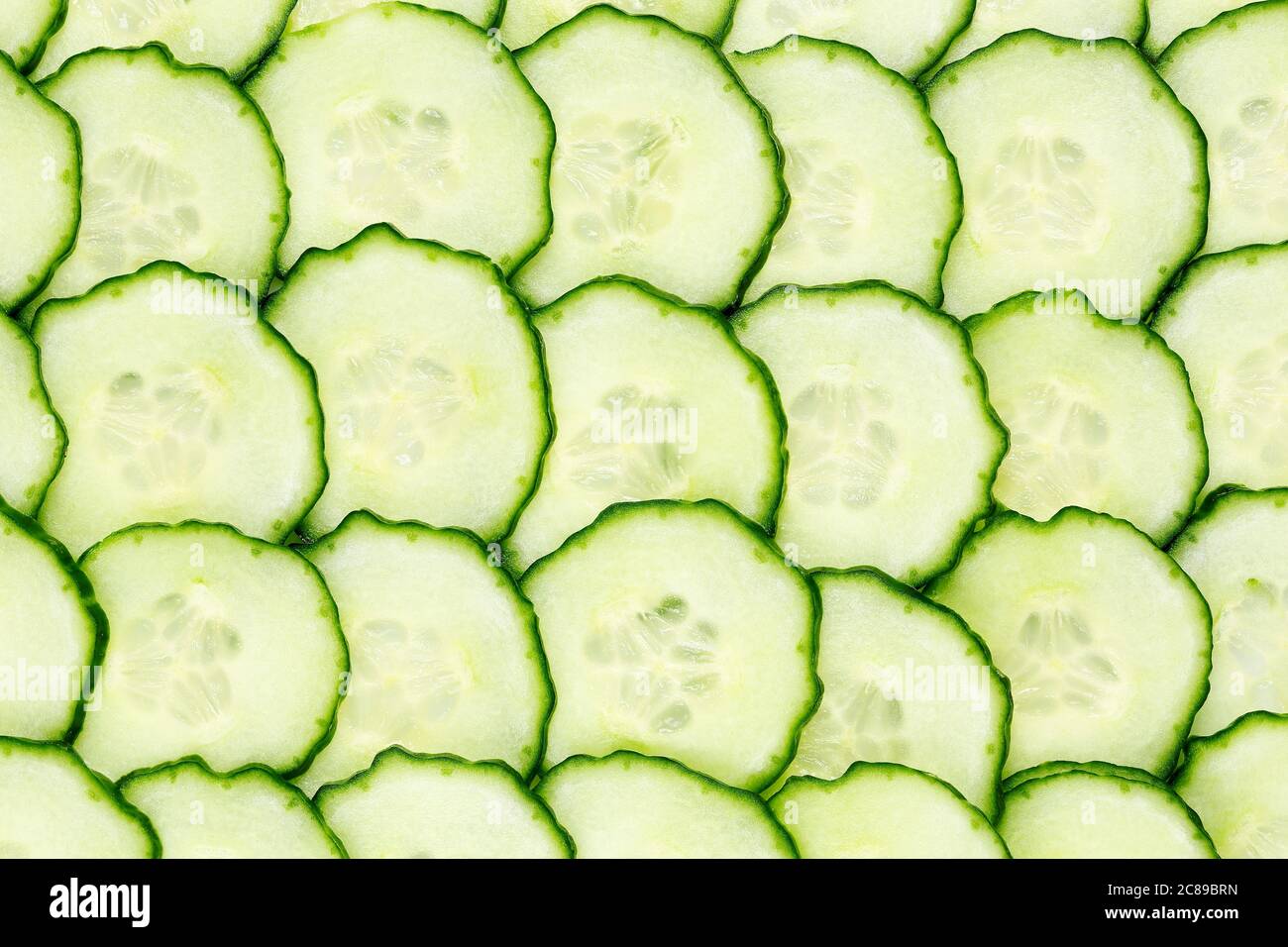 fresh cucumber slices closeup for backgrounds Stock Photo - Alamy