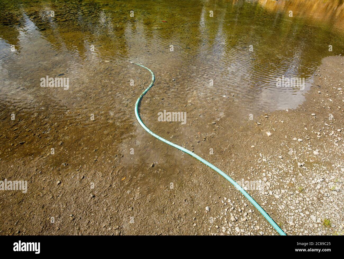 Hose laying hi-res stock photography and images - Alamy