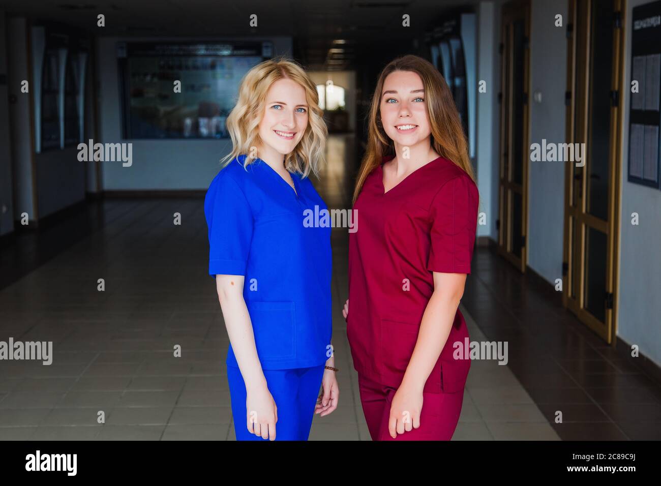 Nursing School. Two of professional medical students in scrubs. Staff ...