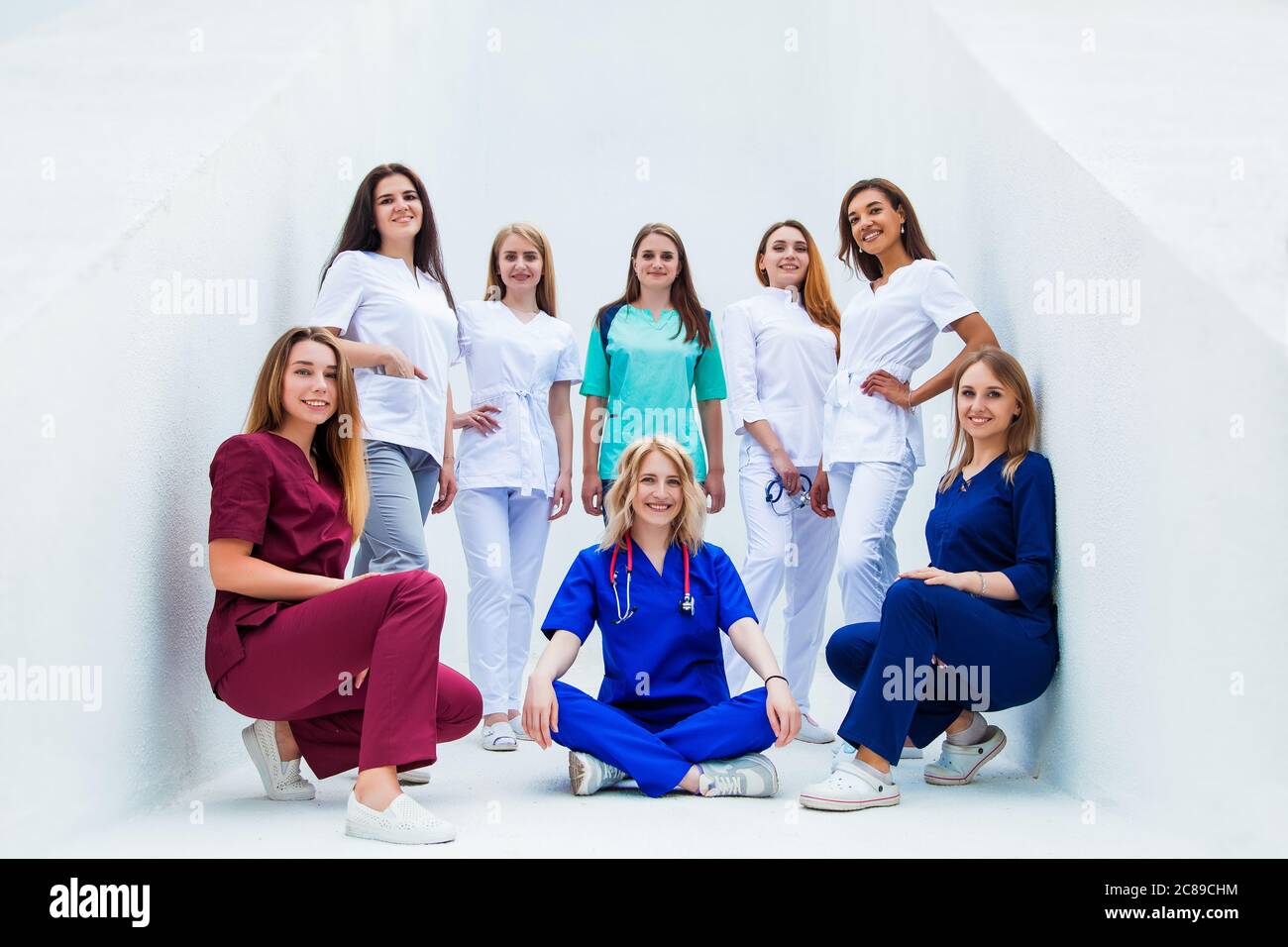 Smiling group of young medical students with mixed-race. A staff of ...