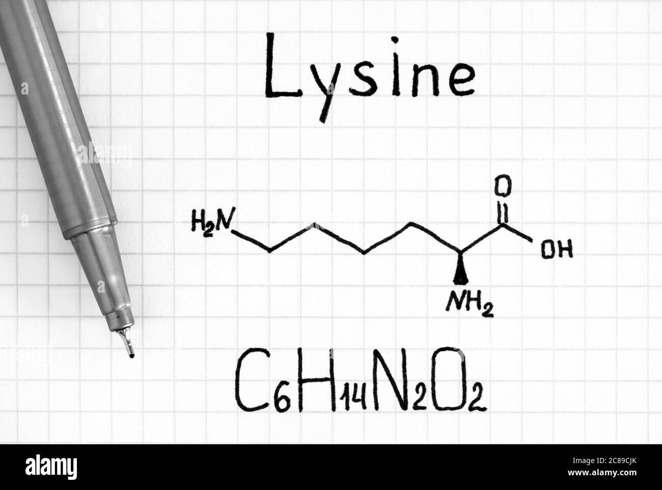 Chemical formula of Lysine with pen. Close-up Stock Photo - Alamy
