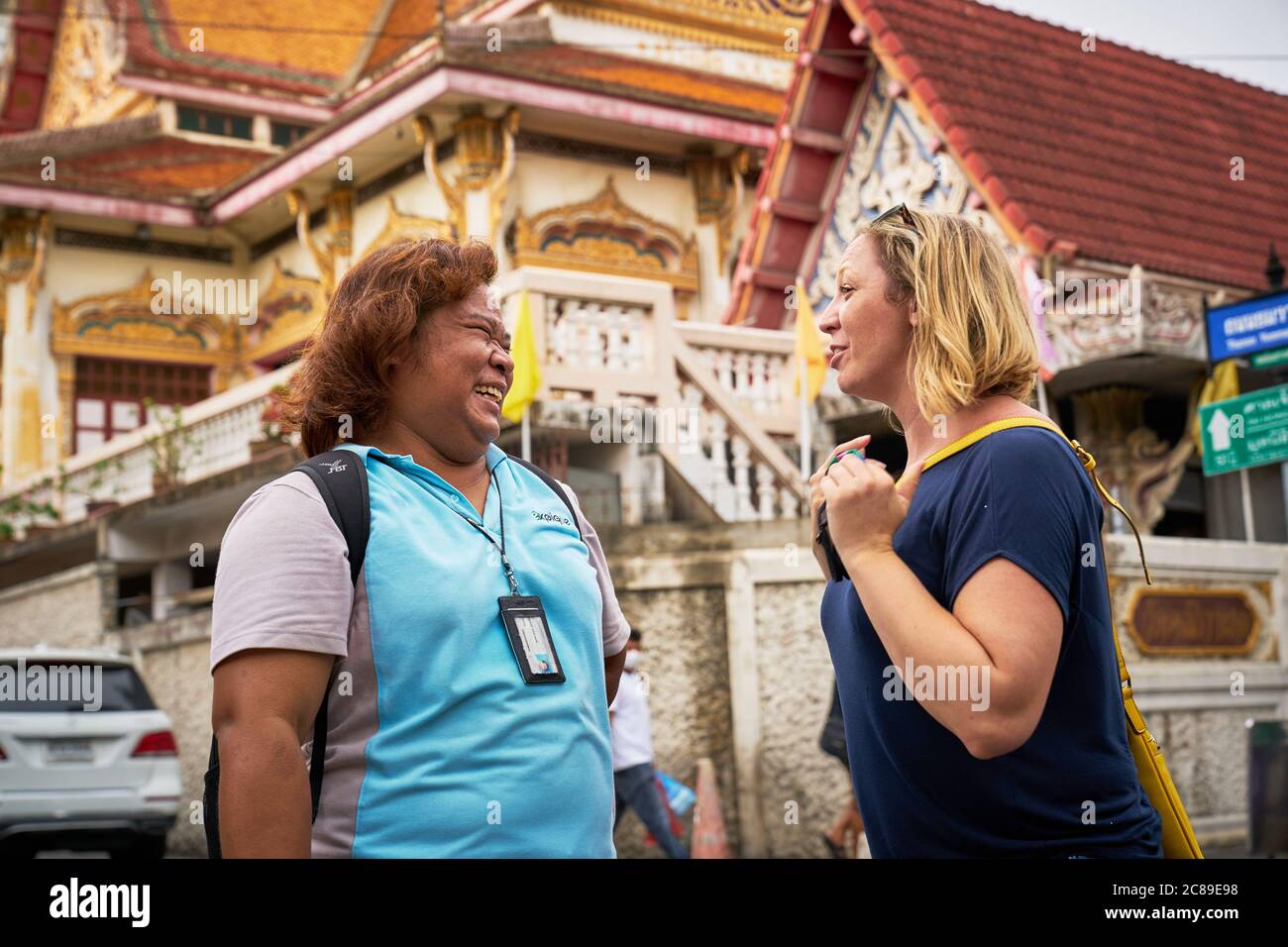 Guided by a local tour guide around Chinatown, Bangkok Stock Photo - Alamy