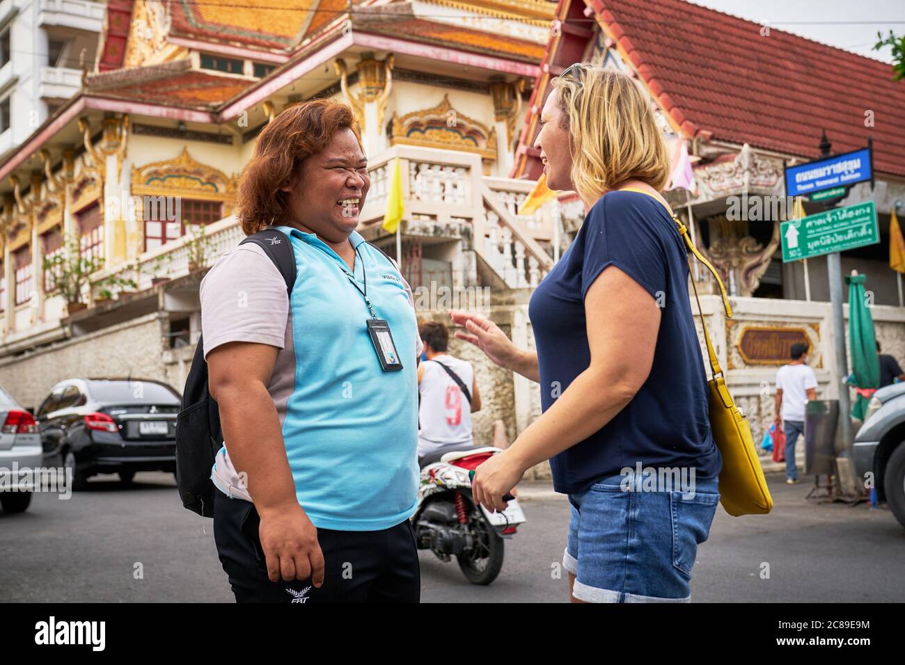 Guided by a local tour guide around Chinatown, Bangkok Stock Photo - Alamy