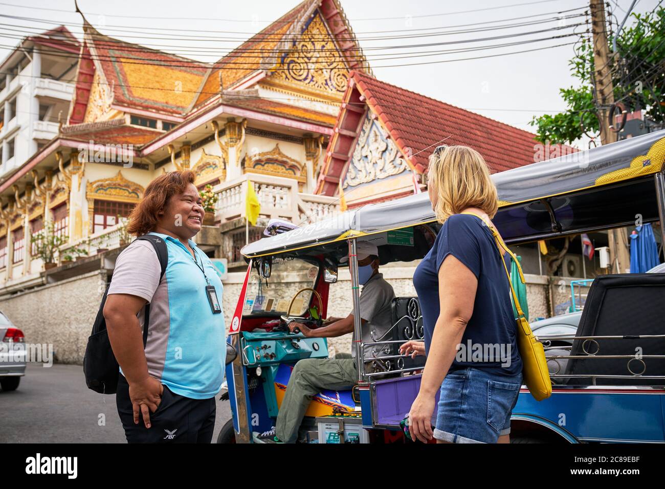 Guided by a local tour guide around Chinatown, Bangkok Stock Photo - Alamy