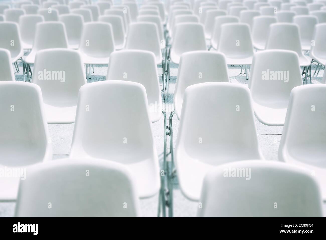 Stalls of white plastic and steel chairs for outdoor events Stock Photo ...