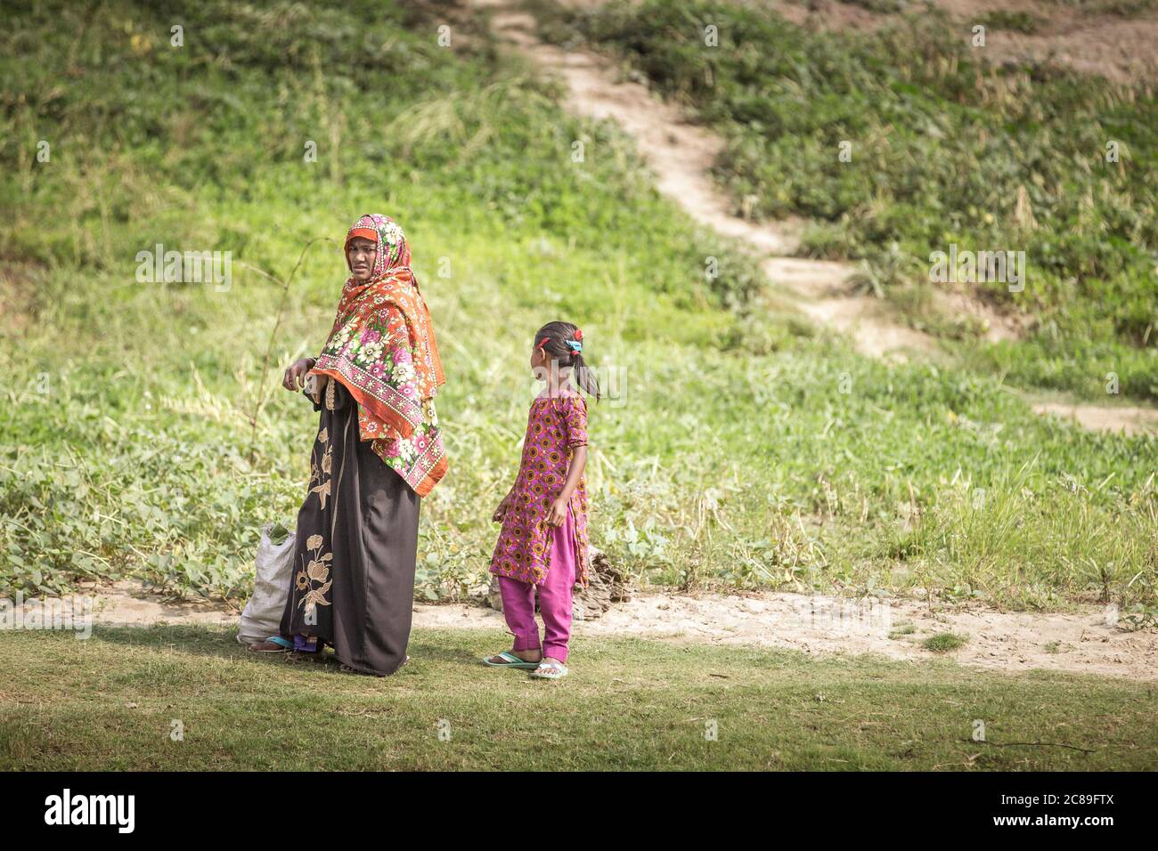 Chittagong, Bangladesh, 25th February 2016: bangladeshi woman walking ...