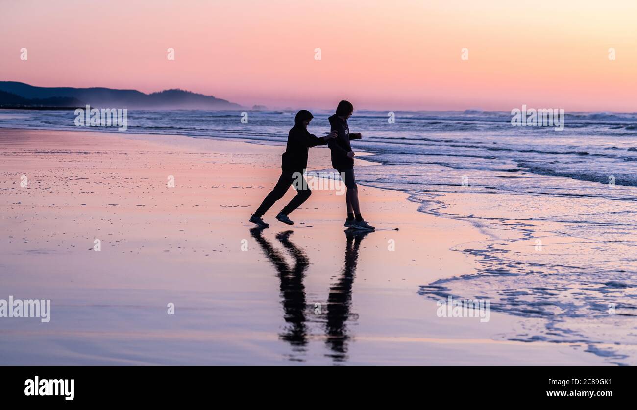 Fun at the Beach in Oregon Stock Photo - Alamy