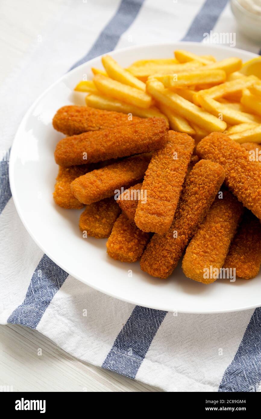 Homemade Fish Sticks and Fries with Tartar Sauce, side view Stock Photo ...