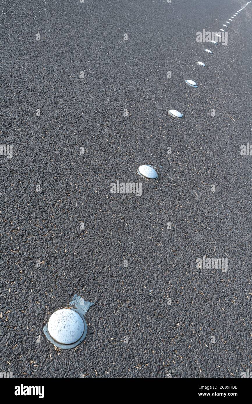 Pattern of Markings on a Paved Road Stock Photo - Alamy