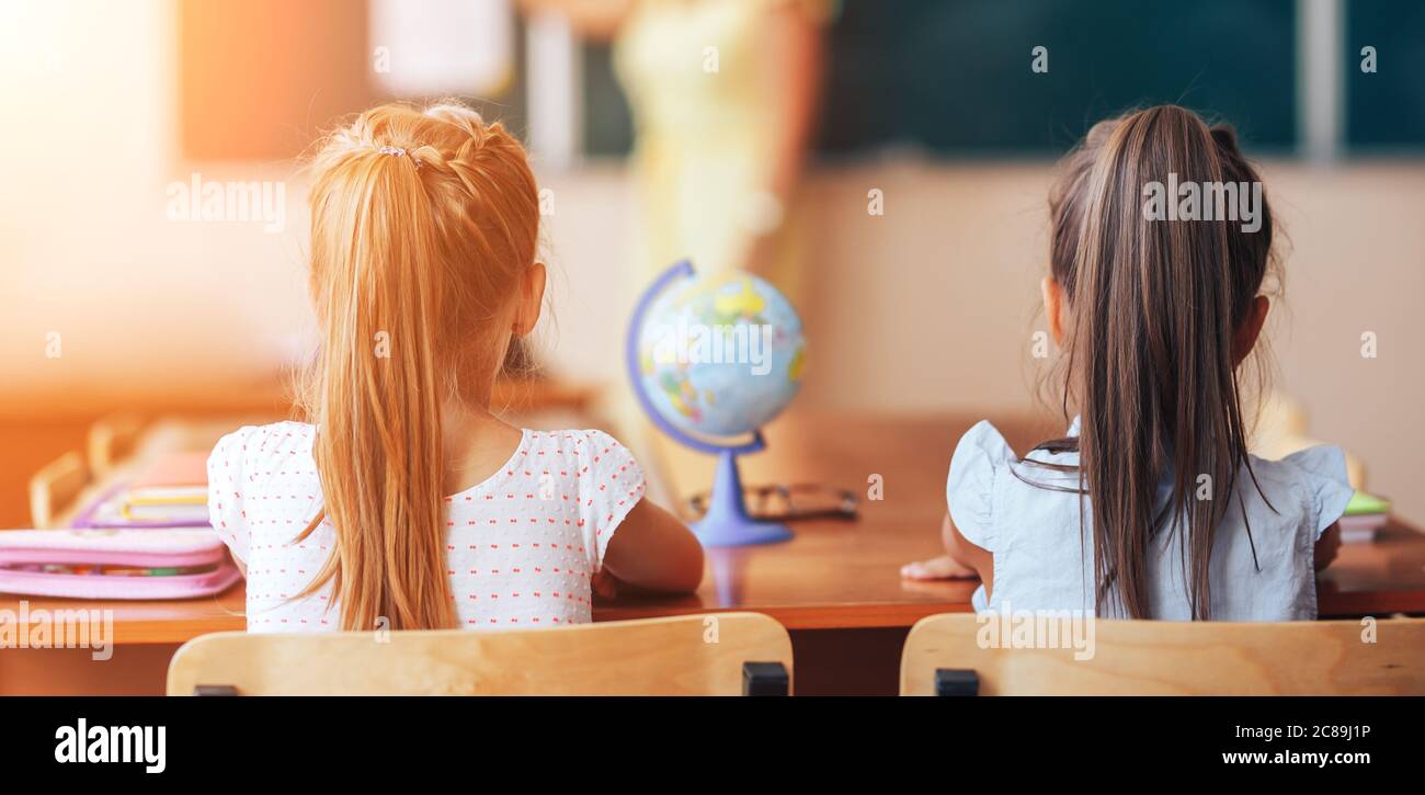 Listen carefully children hi-res stock photography and images - Alamy