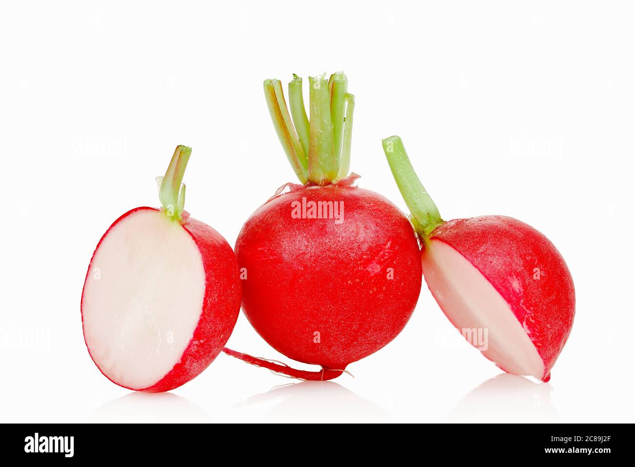 whole and half radishes isolated on white Stock Photo - Alamy