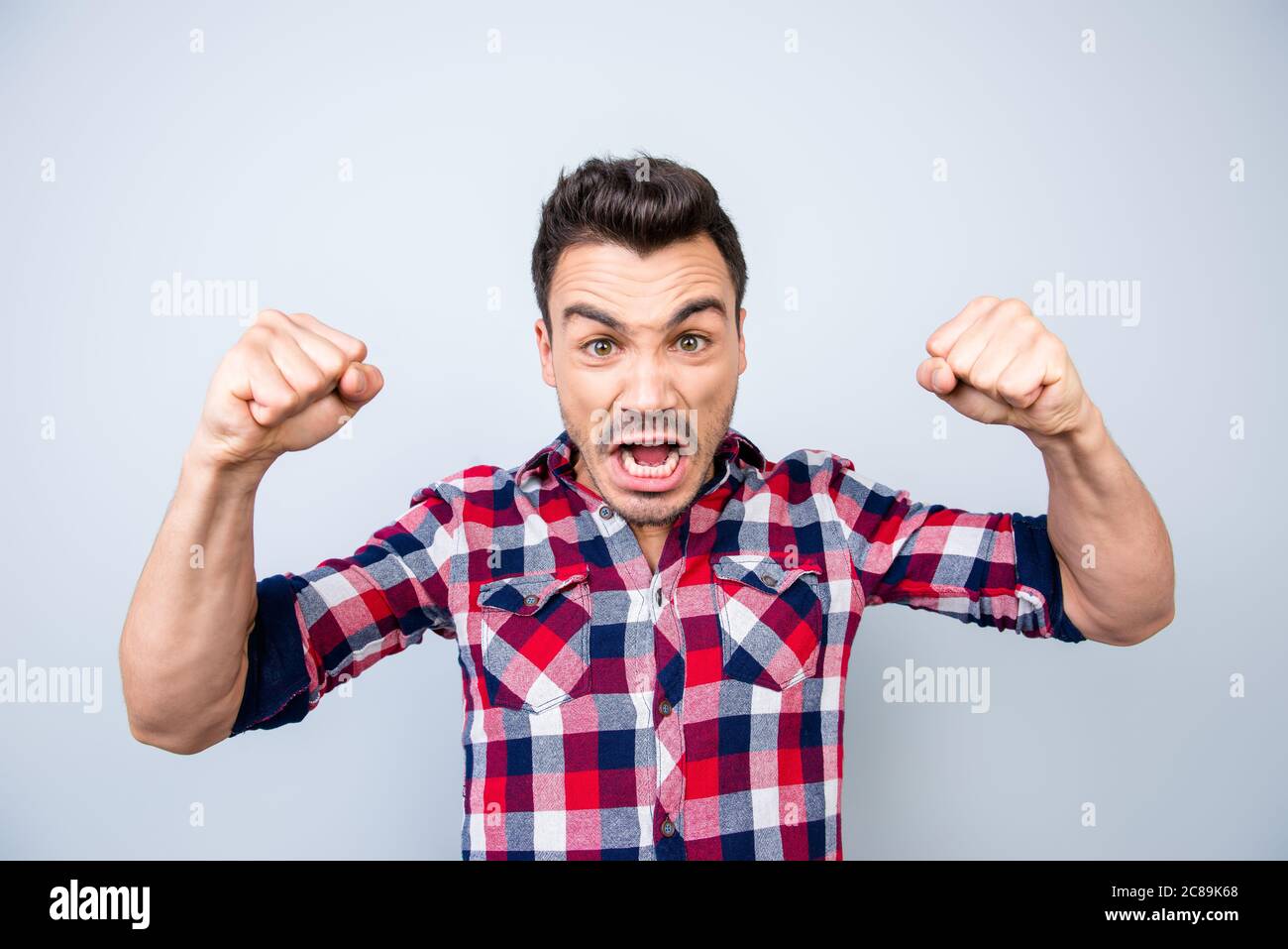 Athlete young hipster is showing his internal strength, such muscular ...