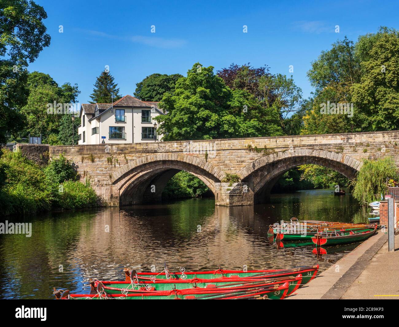 Rowing boats on the River Nidd at High Bridge in Knaresborough North ...