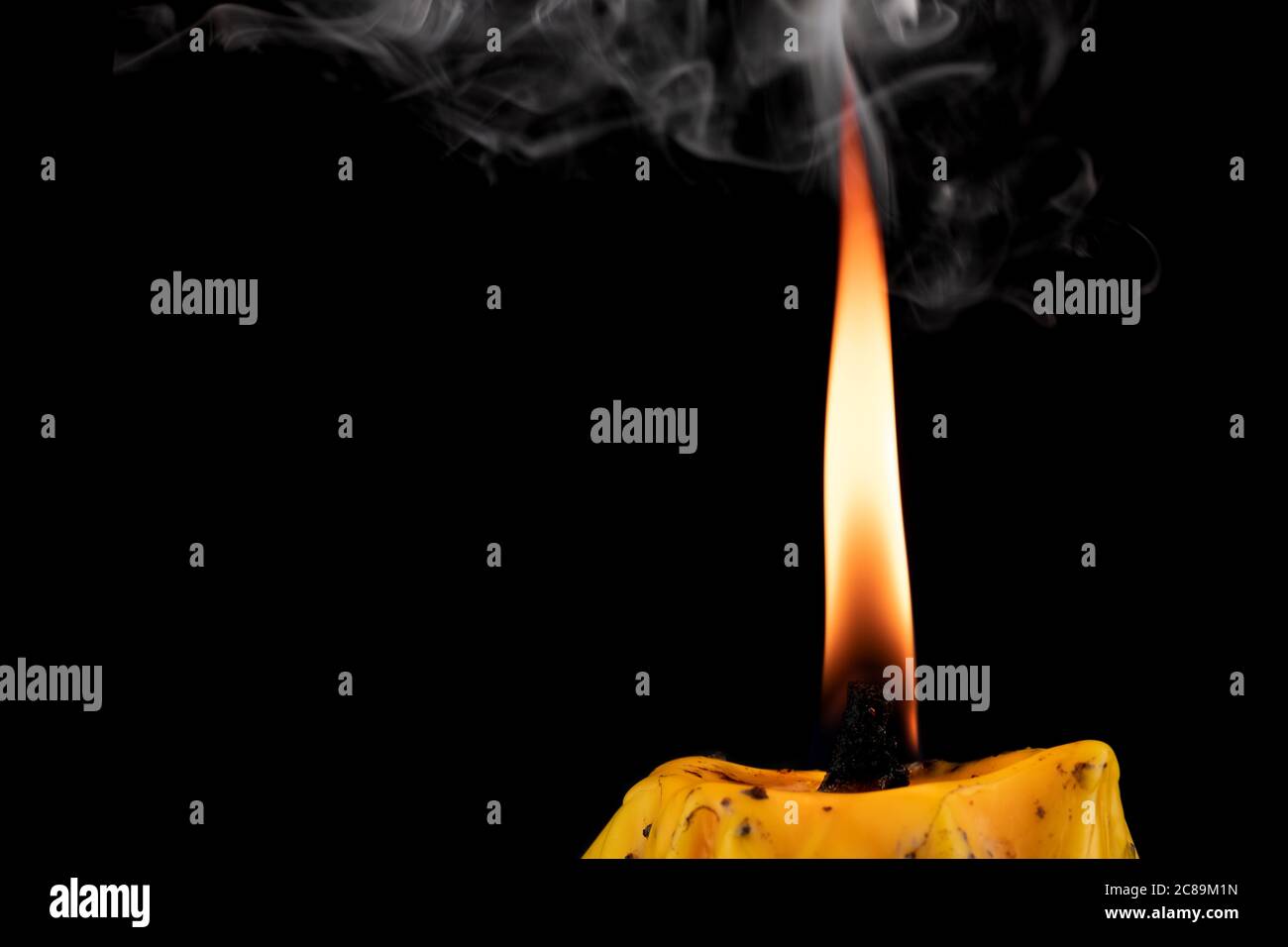 Extinguished candle with smoke happen at black background Stock Photo ...