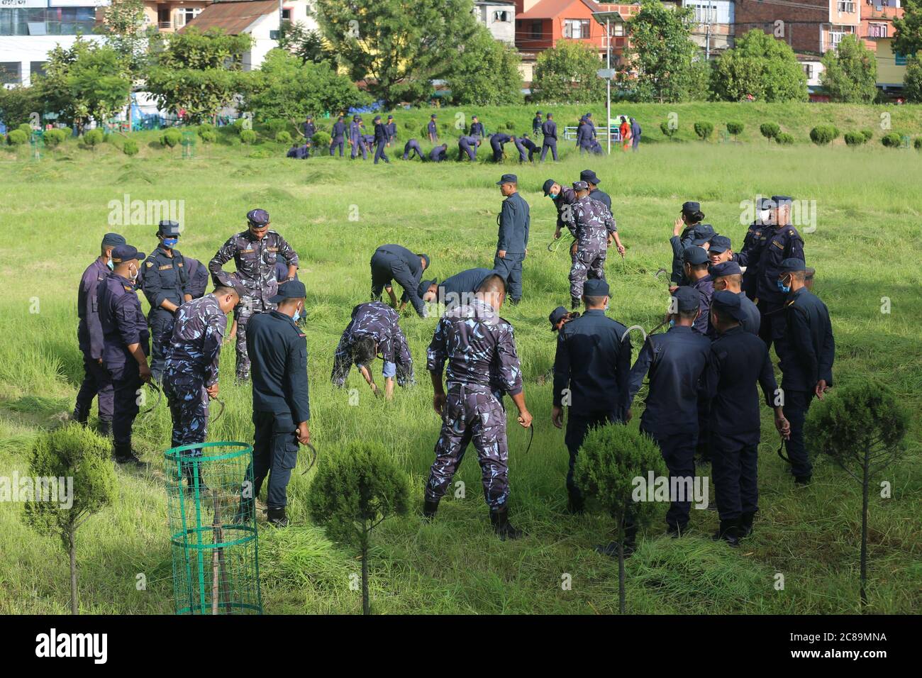 Kathmandu. 22nd July, 2020. Nepali police officers work at a park in ...