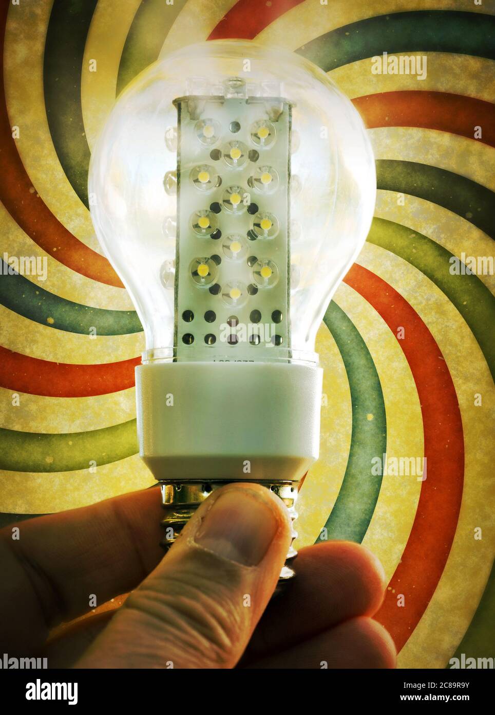 Light bulb held in palm Stock Photo - Alamy