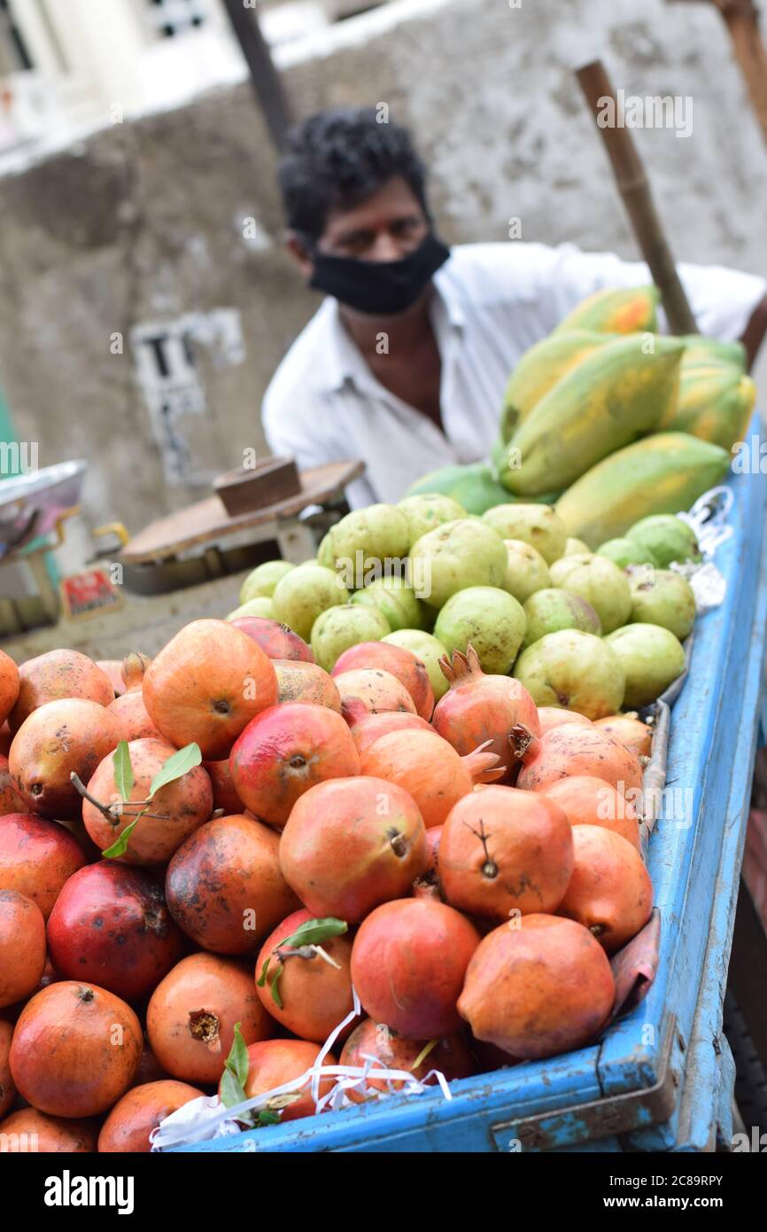 Hyderabad, Telangana, India. july-20-2020: the fruits trader was behind ...