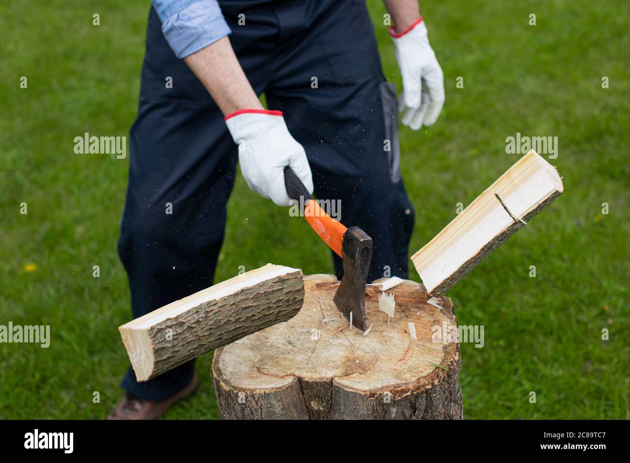 Strong woodcutter chopping wood in hi-res stock photography and images ...