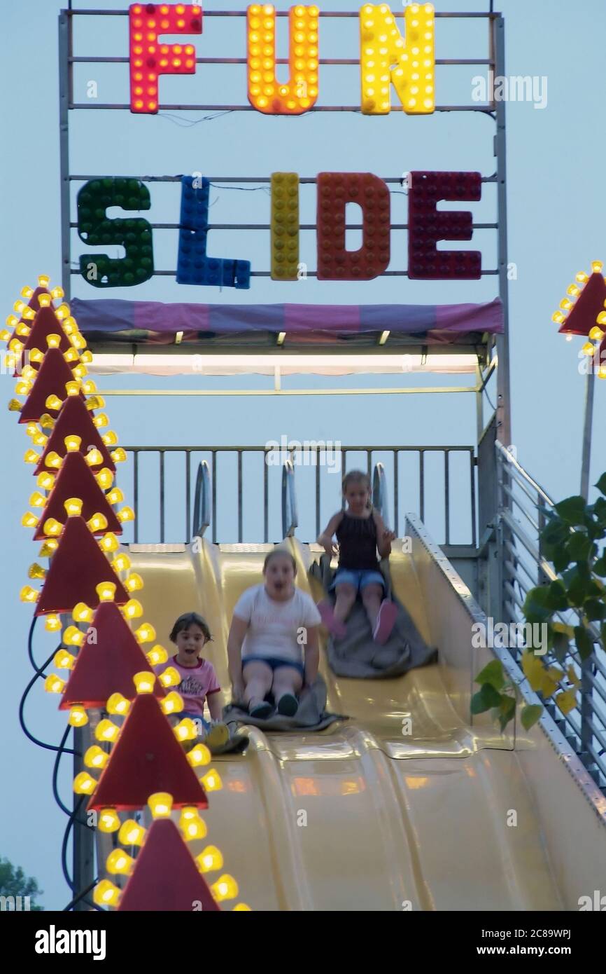 ST. CHARLES, UNITED STATES - Jul 10, 2008: Kids on a fun slide at a ...