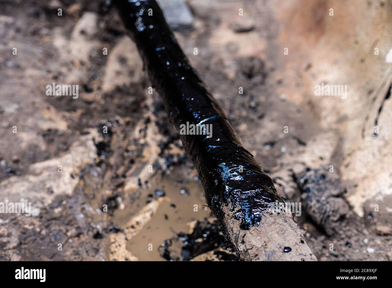 gas pipe in resin. Resin-treated pipe treated with resin Stock Photo ...