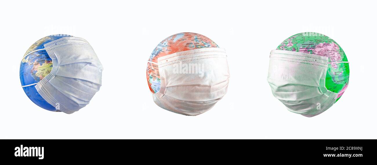 three earth globes of different colors blue, red and green with ...
