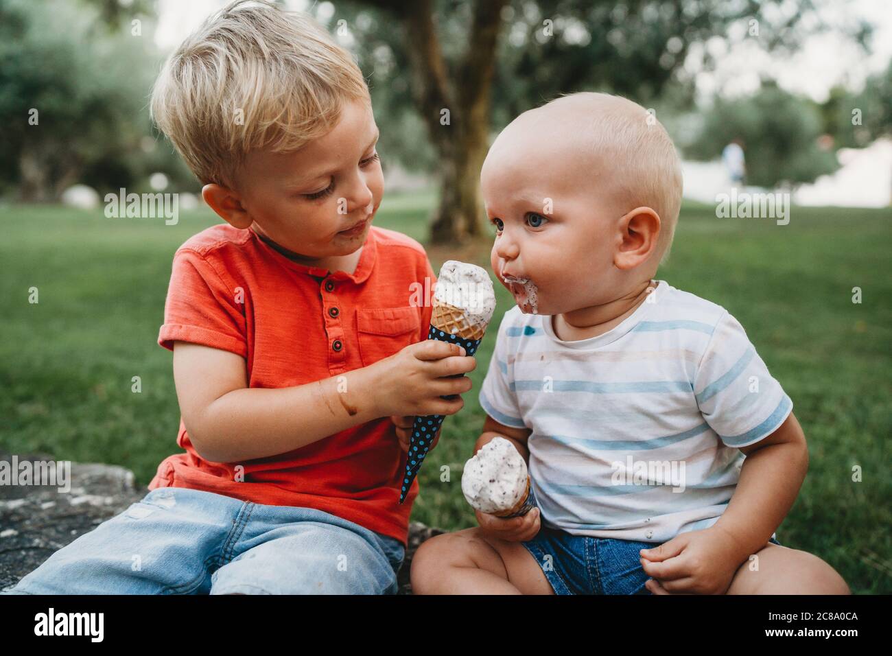 Kids Sharing Ice Cream