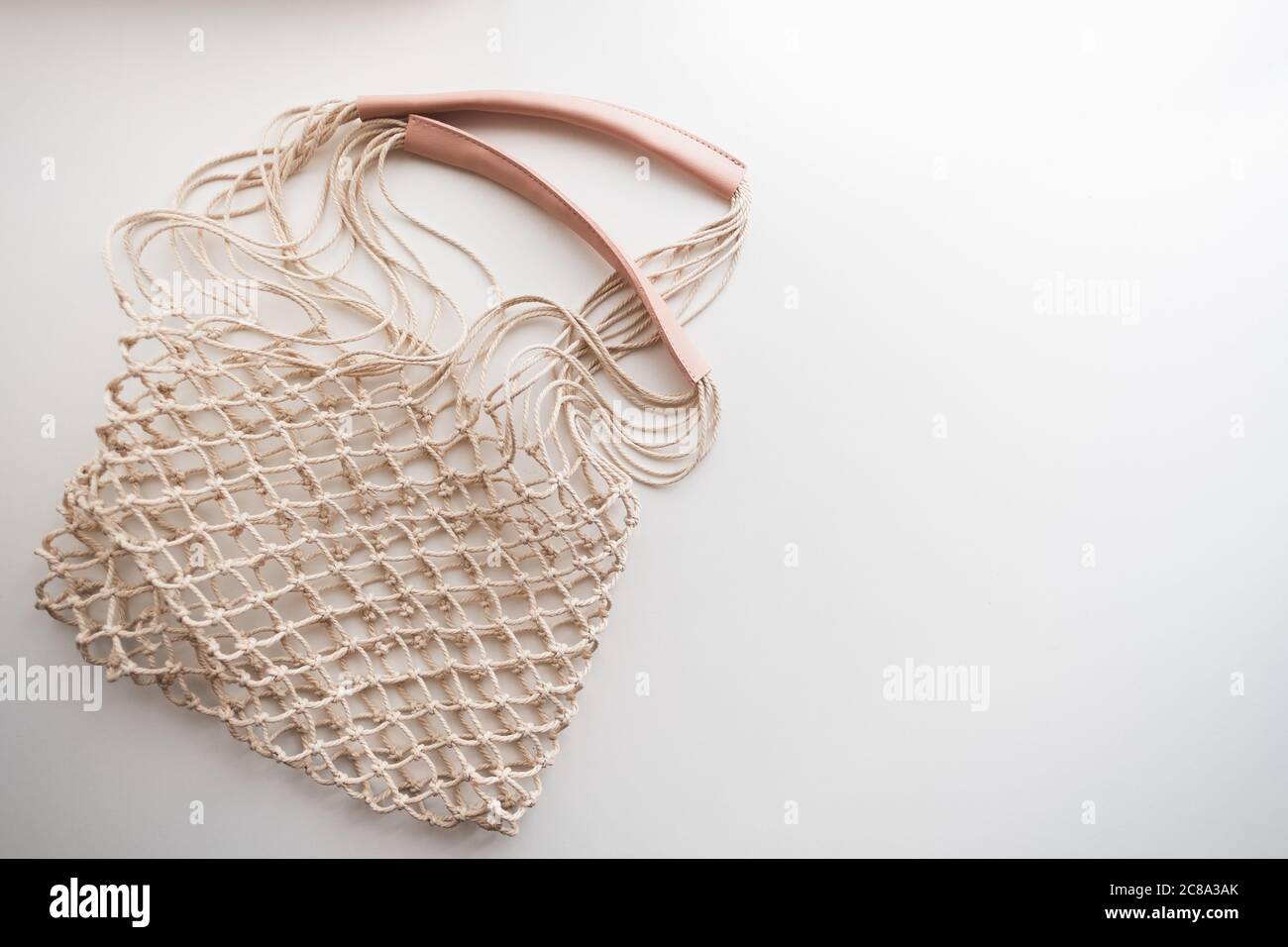 Zero waste eco net bag on white background, copy space Stock Photo - Alamy