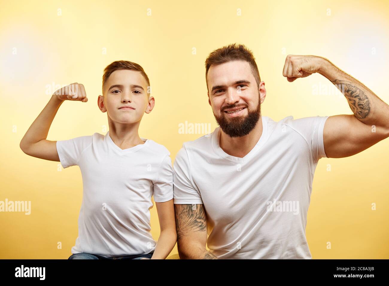 Show biceps hi-res stock photography and images - Alamy